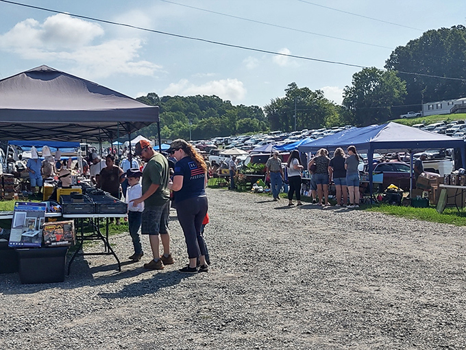 Deals as far as the eye can see! Shoppers browse under tents at the expansive Jonesborough Flea Market.