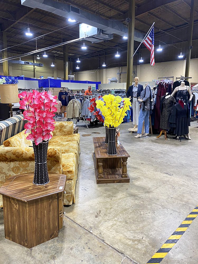 Inside Ladies of Charity, vintage furniture and colorful flowers create vignettes that spark the imagination.