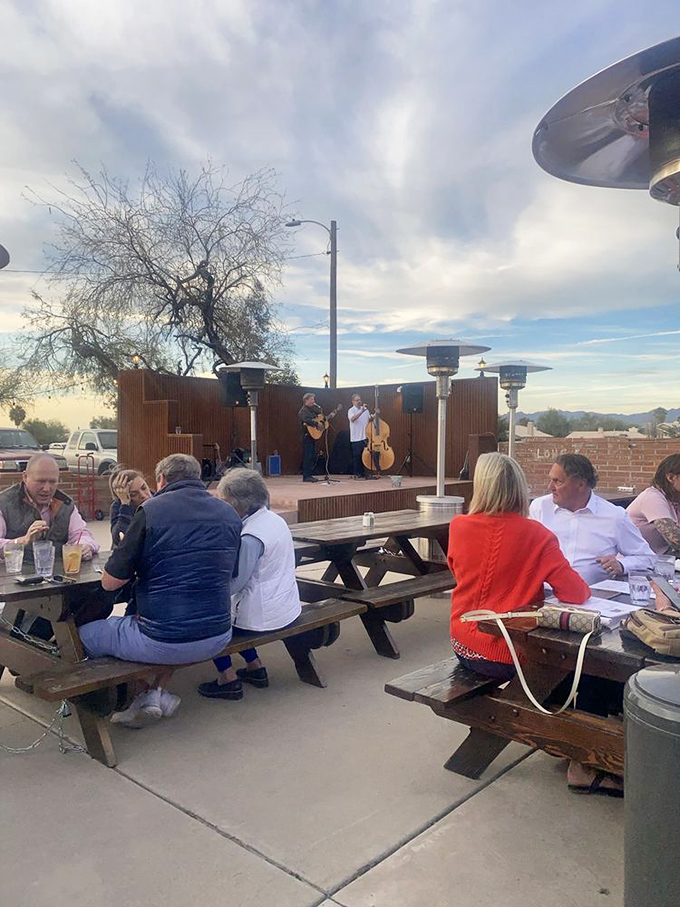 When the music plays and the mesquite smoke rises at Li'l Abner's outdoor space, you've found the Arizona that tourists rarely discover.
