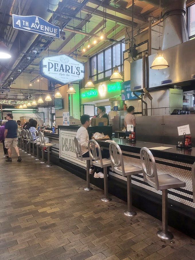 The neon sign beckons like a lighthouse for hungry shoppers. Pearl's brings the ocean to the heart of Philadelphia's historic market.