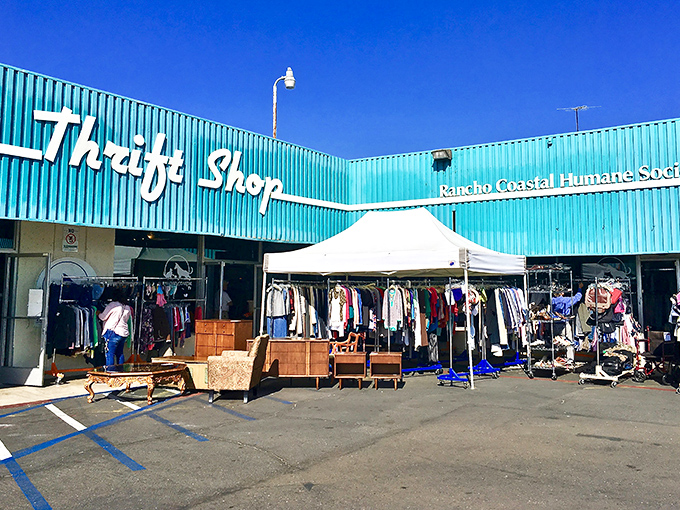 Outdoor racks hint at the treasures within. This coastal thrift shop proves one person's castoffs become another's beachside style statement.