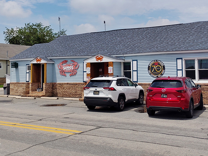 The brick foundation and simple blue siding hide decades of crab-cracking wisdom at this beloved Delaware institution.