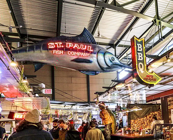 Market magic in Milwaukee! Where bustling energy meets fresh-caught treasures under the watchful eye of that impressive fish.