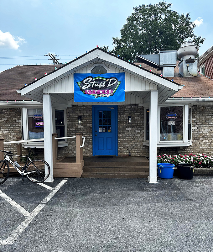 Stuff'D's charming stone building and blue door look like a storybook setting for serious sandwich business. Even the flowers seem happy to be there.