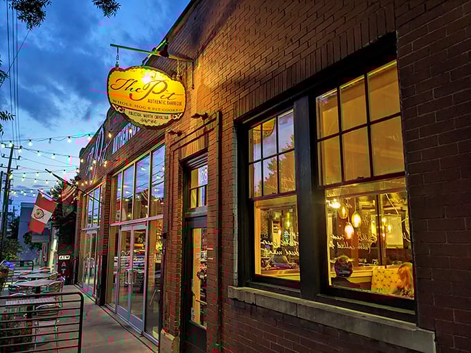 Dusk settles on The Pit as its golden sign beckons hungry souls. Inside those brick walls, chicken dreams come true.