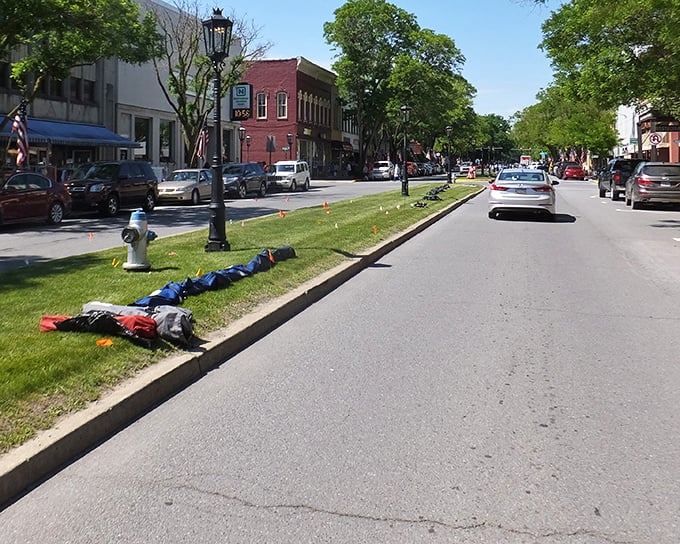 The heart of Wellsboro welcomes visitors with American flags and the promise of small-town hospitality around every corner.