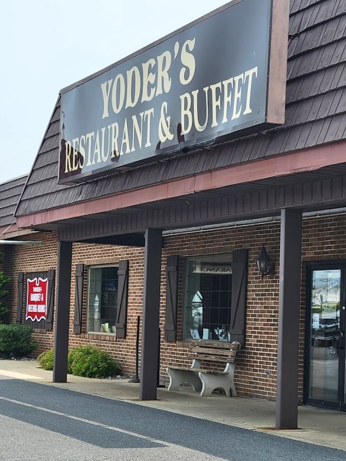 The Yoder's sign promises buffet delights within. Those benches outside are for catching your breath between helpings!