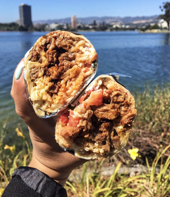 This al pastor burrito, photographed lakeside, contains enough flavor-packed ingredients to fuel any outdoor adventure perfectly. 