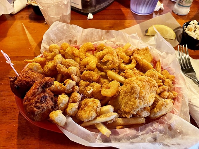 The holy trinity of coastal comfort food: crispy fried shrimp, flaky flounder, and french fries. Diet starts tomorrow, obviously.