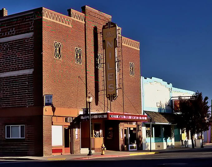 The Niles Theater's vintage marquee lights up Main Street, offering entertainment without the need for subscription services or password sharing.