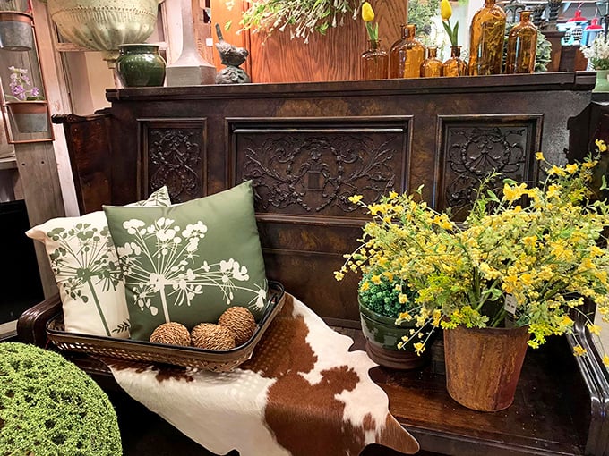 That cowhide suitcase setup isn't just furniture—it's a conversation piece that whispers, "I have stories to tell."