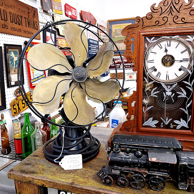 An antique fan sits beside a vintage clock and toy train&mdash;the holy trinity of nostalgia that makes grown men suddenly remember their childhood bedrooms.