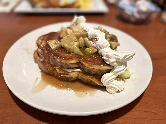 French toast architecture at its finest&mdash;layers of bread, caramel, and apple create the breakfast equivalent of winning the lottery.