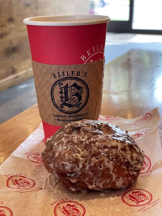 The dynamic duo: a glistening apple fritter and steaming coffee. Name a more iconic breakfast partnership&mdash;I'll wait.