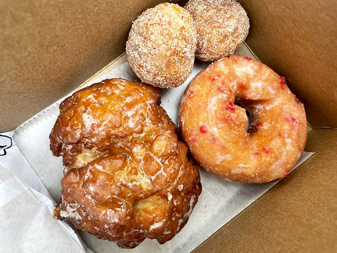 Donut nirvana achieved: apple fritters and glazed pastries that would make even the most disciplined nutritionist whisper, "Just this once."