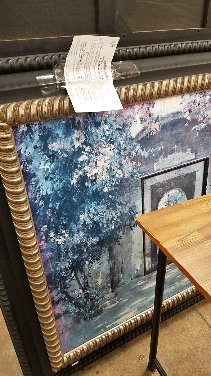 Ornate frame, dreamy landscape&mdash;instant sophistication for any wall. Someone's grandmother probably fought to keep this out of the donation pile.