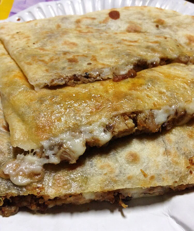 Cheese stretching like the final scene of a food commercial, this quesadilla has star quality that would make even a method actor break character.