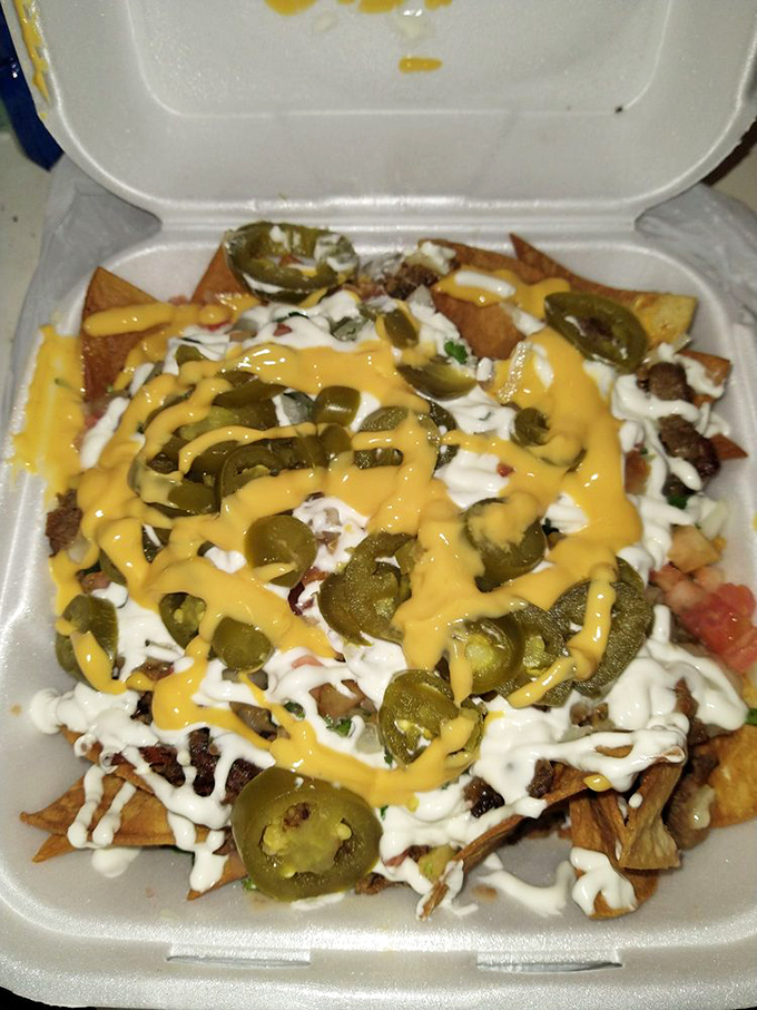 Loaded nachos that laugh in the face of dainty portions. The cheese-to-jalape&ntilde;o distribution would make Marie Kondo proud.