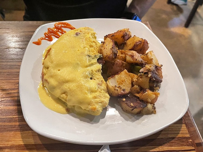 Hollandaise: the sunshine-colored sauce that makes everything better. This omelette proves that yellow is indeed the color of breakfast happiness.