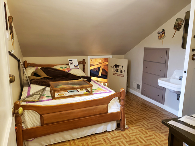 The attic bedroom offers cozy accommodations with a sloped ceiling. Just don't sleepwalk or you might find yourself in a nursery rhyme situation.
