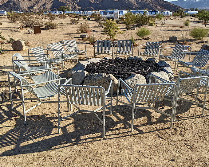 Sunset gatherings around the fire pit at Joshua Tree accommodations offer the perfect end to a day of exploration. S'mores, anyone?