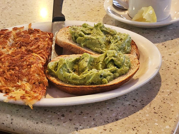 Avocado toast meets hash browns in this delicious compromise between your health-conscious self and your diner-loving soul.v