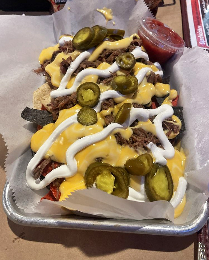 BBQ nachos that redefine the concept of "loaded." These aren't just topped&mdash;they're an architectural achievement of cheese, jalape&ntilde;os, and perfectly smoked meat.