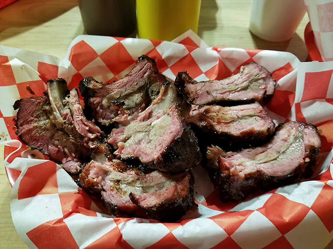 These ribs have the kind of smoke ring that would make a pitmaster weep with joy. The pink halo isn't just color&mdash;it's a certificate of authenticity.