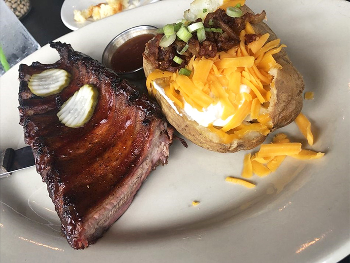 A loaded potato and ribs—the barbecue equivalent of Astaire and Rogers, dancing the tango of texture and flavor across your eager palate.