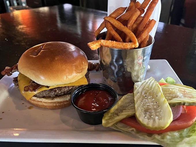 The classic burger gets the royal treatment—crispy fries, perfectly melted cheese, and a golden bun that whispers, "Take a picture first."
