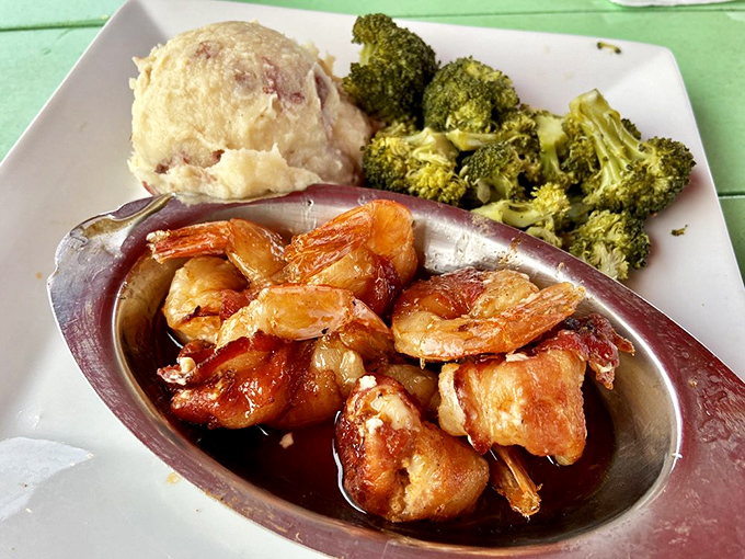 Bacon-wrapped shrimp with mashed potatoes and broccoli&mdash;proof that sometimes the simplest combinations create the most profound happiness. Comfort food with a coastal upgrade.