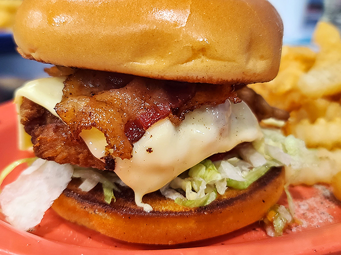 This isn't just a bacon cheeseburger&mdash;it's architecture. Notice how the melted cheese creates that perfect structural support system.