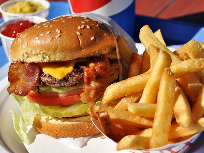The bacon cheeseburger and fries arrive like old friends who've never let you down, worth every minute spent in line and every mile driven.