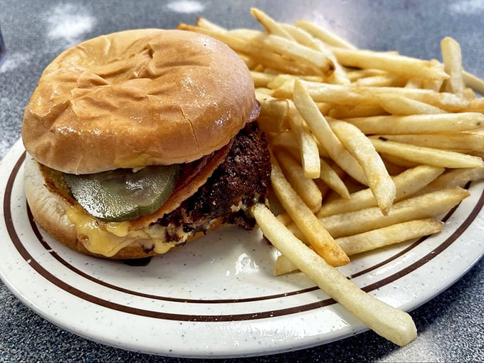 Meet the burger that launched a thousand road trips. That cheese melt isn't Photoshopped; it's just Gordon's everyday magic.