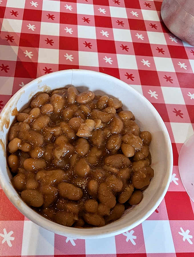 These aren't your average baked beans – swimming in a sweet-savory sauce, they're the unsung heroes of the sides menu.