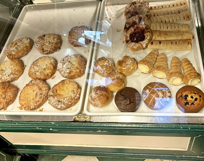 The display case&mdash;where willpower goes to die. Each tray offers a different path to happiness, all equally valid and deliciously justified.