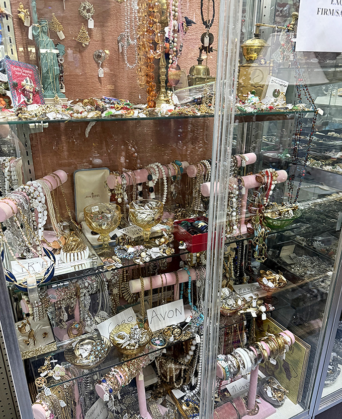 Jewelry that outlasted its original owners, now waiting for second acts. That art deco brooch is practically begging for a night out.