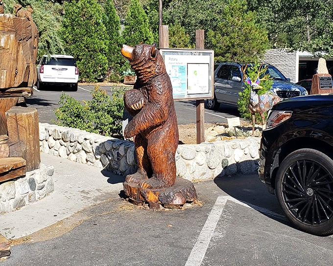 This wooden bear statue isn't just public art &ndash; it's Idyllwild's unofficial greeter, standing tall with the confidence of someone who owns the forest.