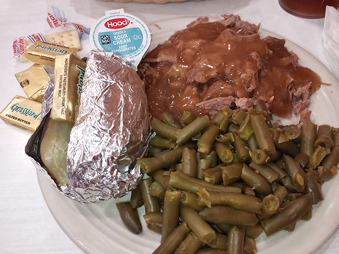 Beef brisket swimming in gravy alongside green beans cooked the way your aunt taught you they should be&mdash;tender, flavorful, and definitely not "al dente."