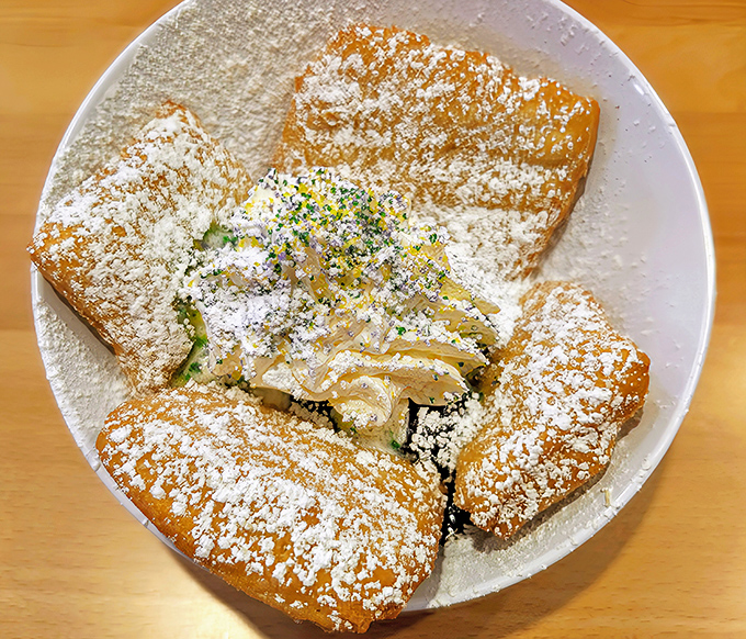 Powdered sugar isn't just a topping here&mdash;it's practically a food group. These beignets are what clouds wish they tasted like.