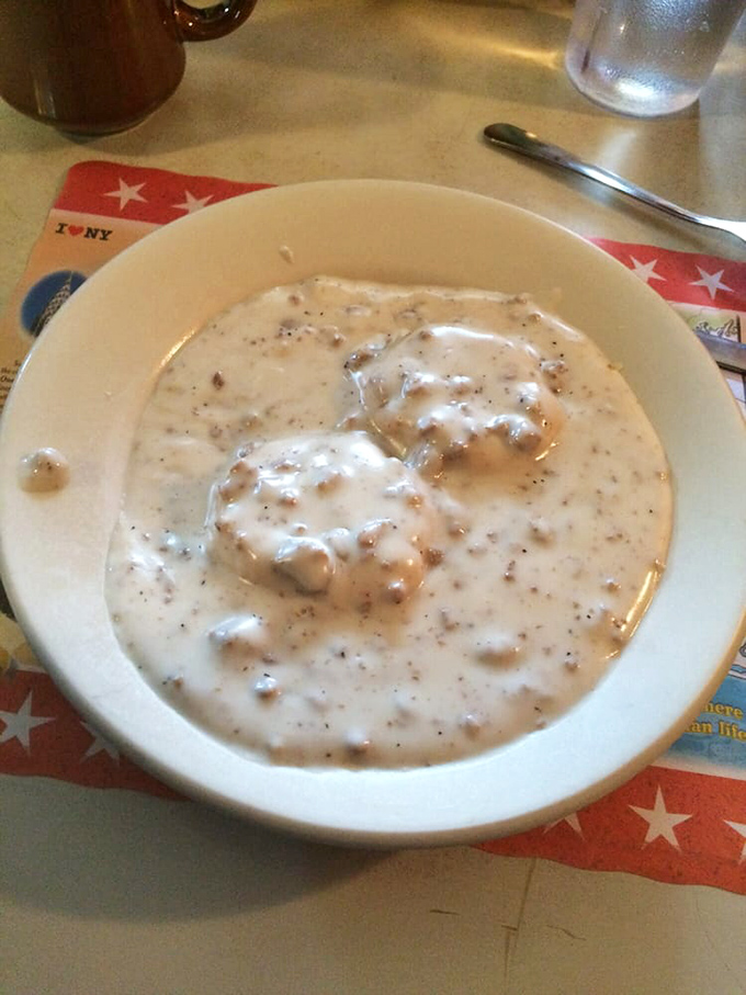 Fluffy biscuits drowning in rich sausage gravy - comfort food that could solve any morning blues.