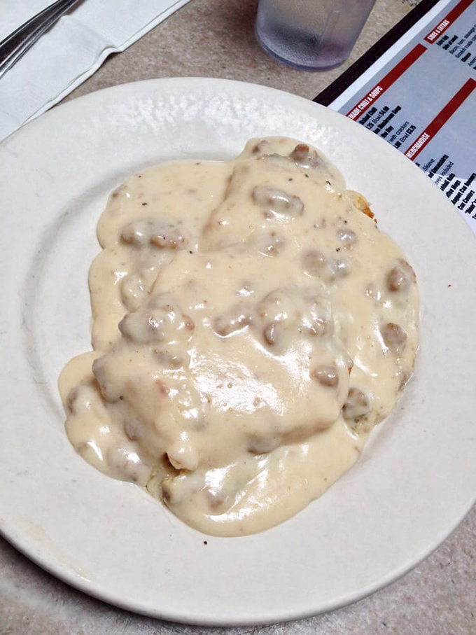 Biscuits drowning in creamy gravy &ndash; the kind of comfort food that makes your grandmother's cooking jealous.
