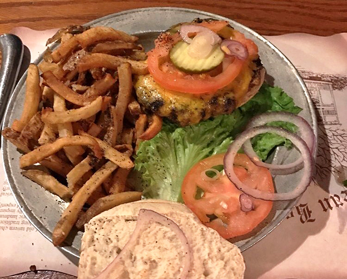 A burger that would make Paul Revere ride through town shouting, "The deliciousness is coming!" Complete with crispy fries that deserve their own declaration of independence.