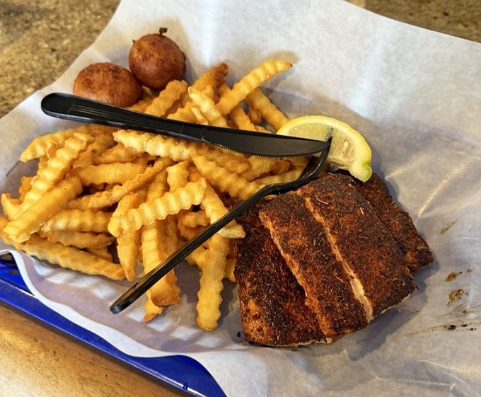 Blackened fish that would make Paul Prudhomme proud. This Mahi wears its seasoning like a badge of honor, crispy exterior giving way to flaky perfection.