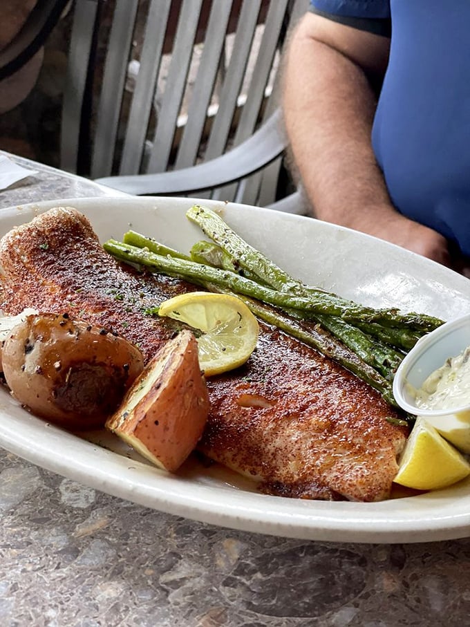 Lake Michigan's finest whitefish, blackened to perfection and served with roasted potatoes and asparagus &ndash; proof that sometimes the simplest preparations yield the most magnificent results.