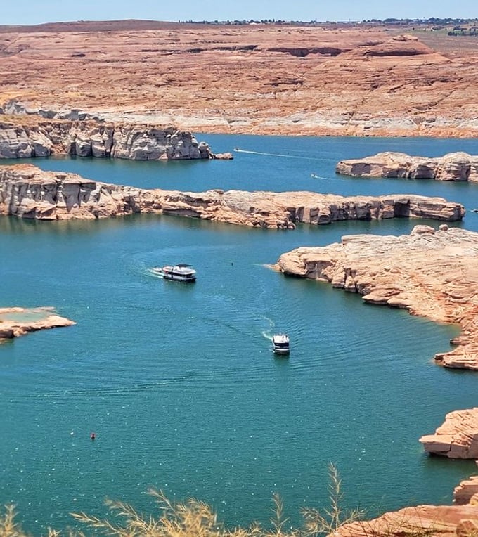 Traffic jam, desert style! These boats navigate Lake Powell's gorgeous channels, where the speed limit is measured in "wows per minute."