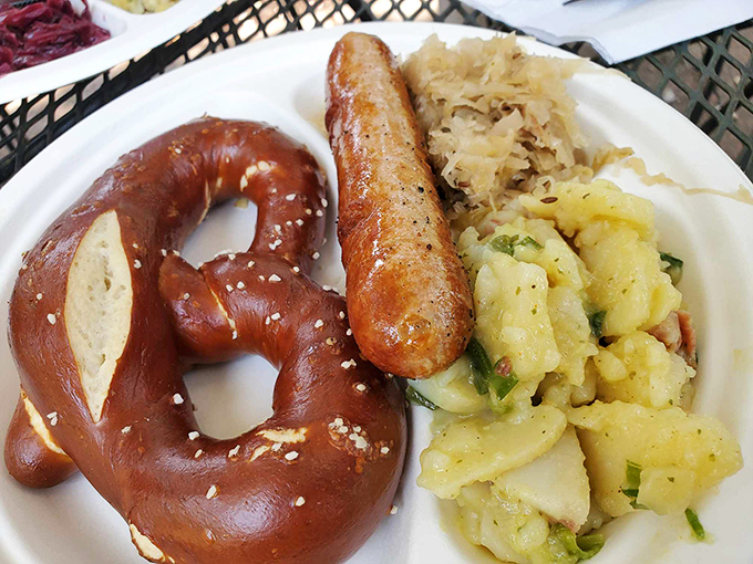 The holy trinity of German comfort: a pretzel that could make Munich proud, bratwurst with perfect snap, and potato salad that grandmothers would fight over.
