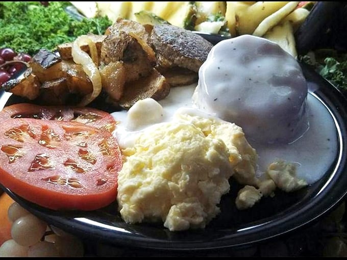 Breakfast plates that could fuel a marathon. The scrambled eggs look like fluffy clouds next to that perfectly grilled tomato&mdash;a morning masterpiece. 