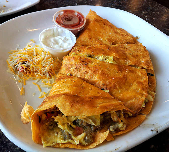 Breakfast quesadillas that laugh in the face of basic morning fare &ndash; crispy, cheesy, and packed with enough flavor to jumpstart your day.