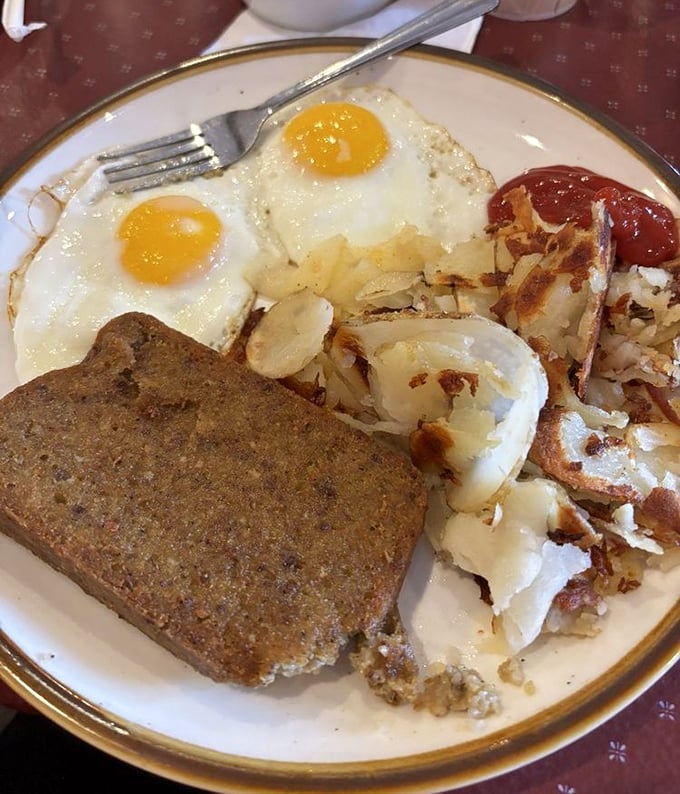 The breakfast trinity&mdash;eggs, potatoes, and scrapple&mdash;a Pennsylvania morning ritual that fuels both body and nostalgia.